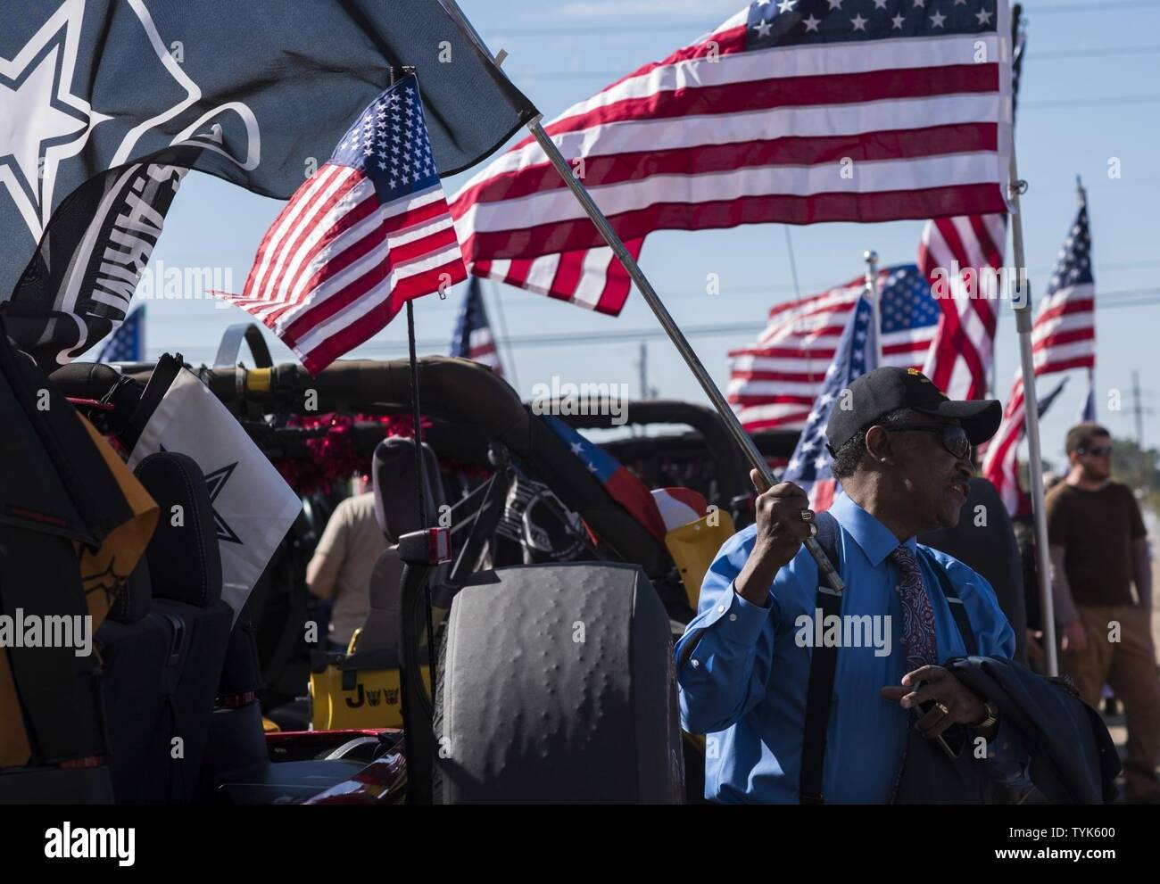 A veteran prepares his vehicle for the Veterans Parade at the State ...