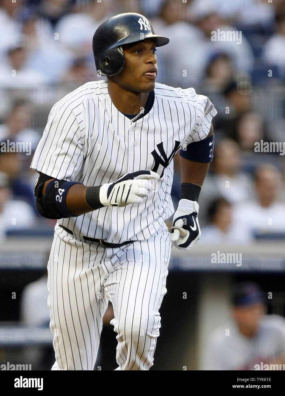New York Yankees Robinson Cano hits a solo homer in the second inning against the New York Mets ...