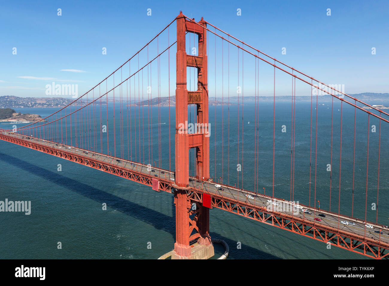 Aerial view of the Golden Gate Bridge tower with San Francisco Bay in ...