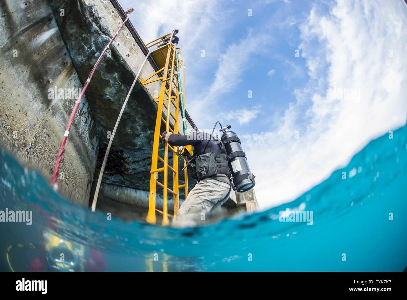 Members of Underwater Construction Team (UCT) 2’s Construction Dive ...