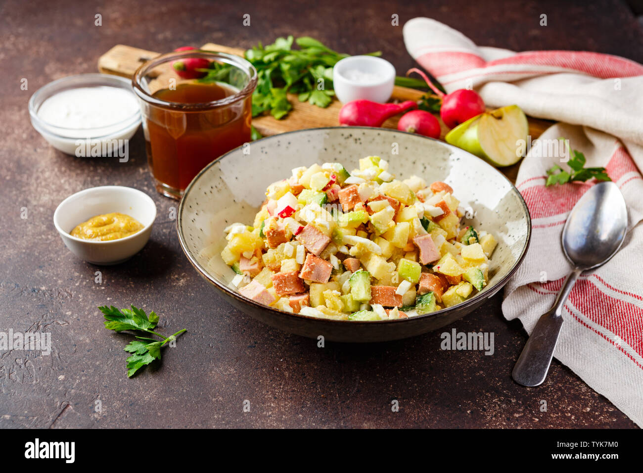 Cold Russian Soup Okroshka with sausage, vegetables and kvass in bowl ...