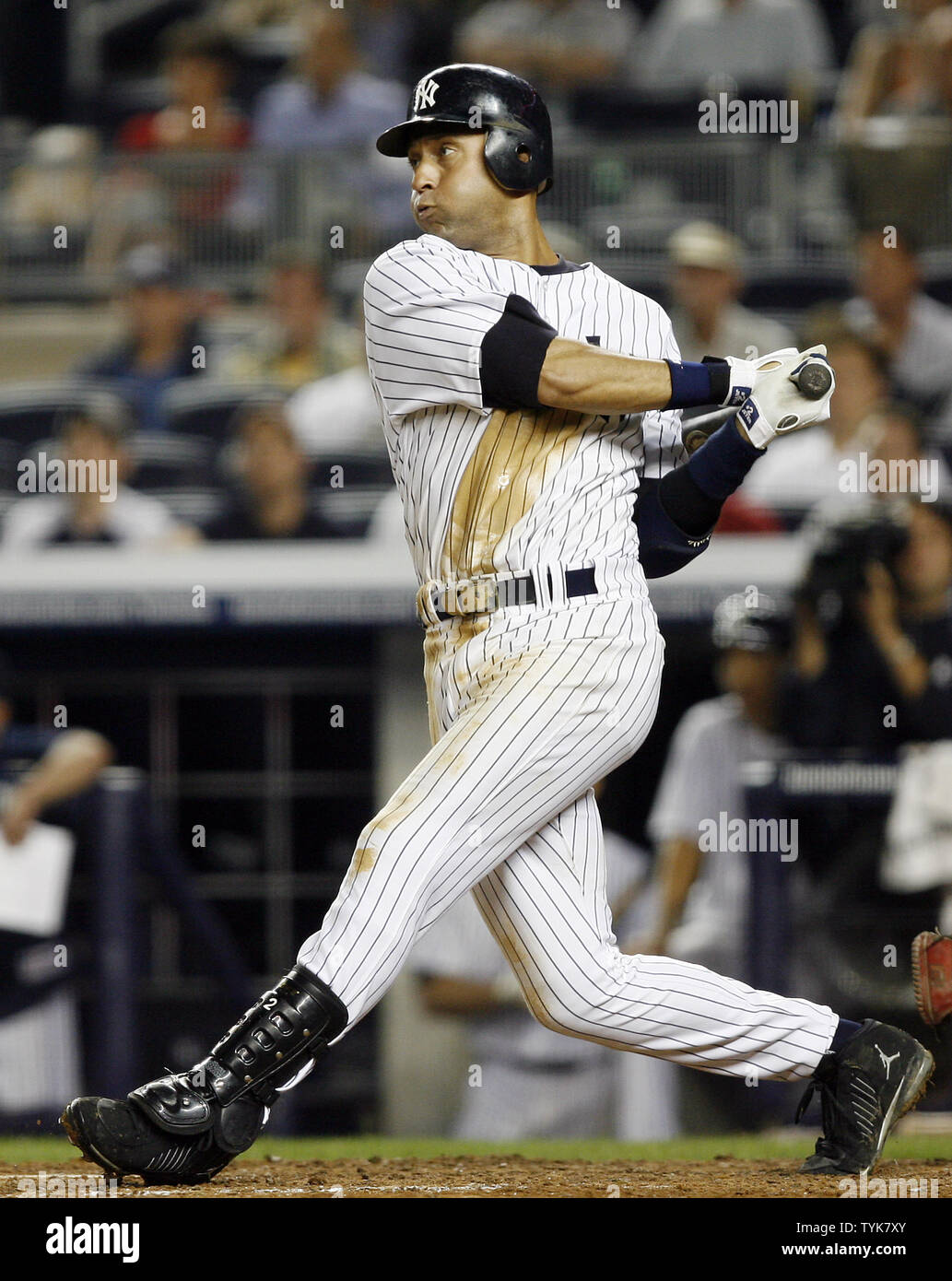 New York Yankees Derek Jeter drives in 2 runs with a single in the ...
