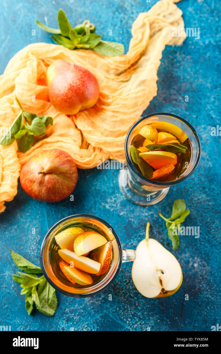 Hot fruit tea with ripe pears and mint, delicious and aromatic Stock ...