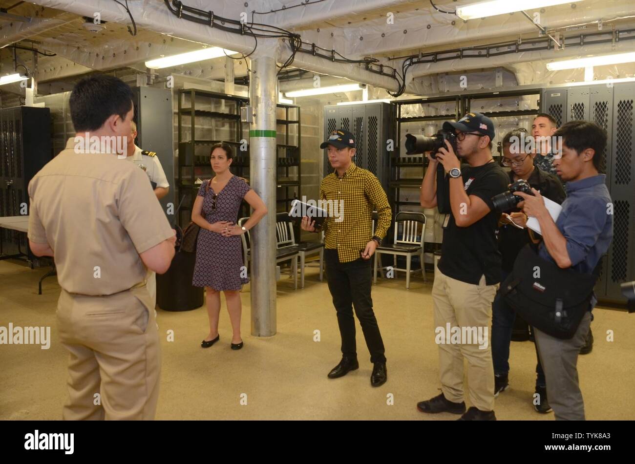 BRUNEI (Nov. 14, 2016) Members of the Brunei media receive a tour of ...