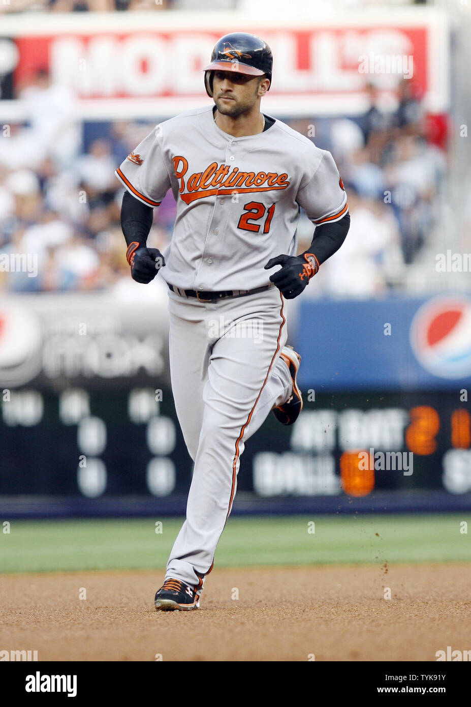 Baltimore Orioles Nick Markakis hits a solo homer against the New York ...