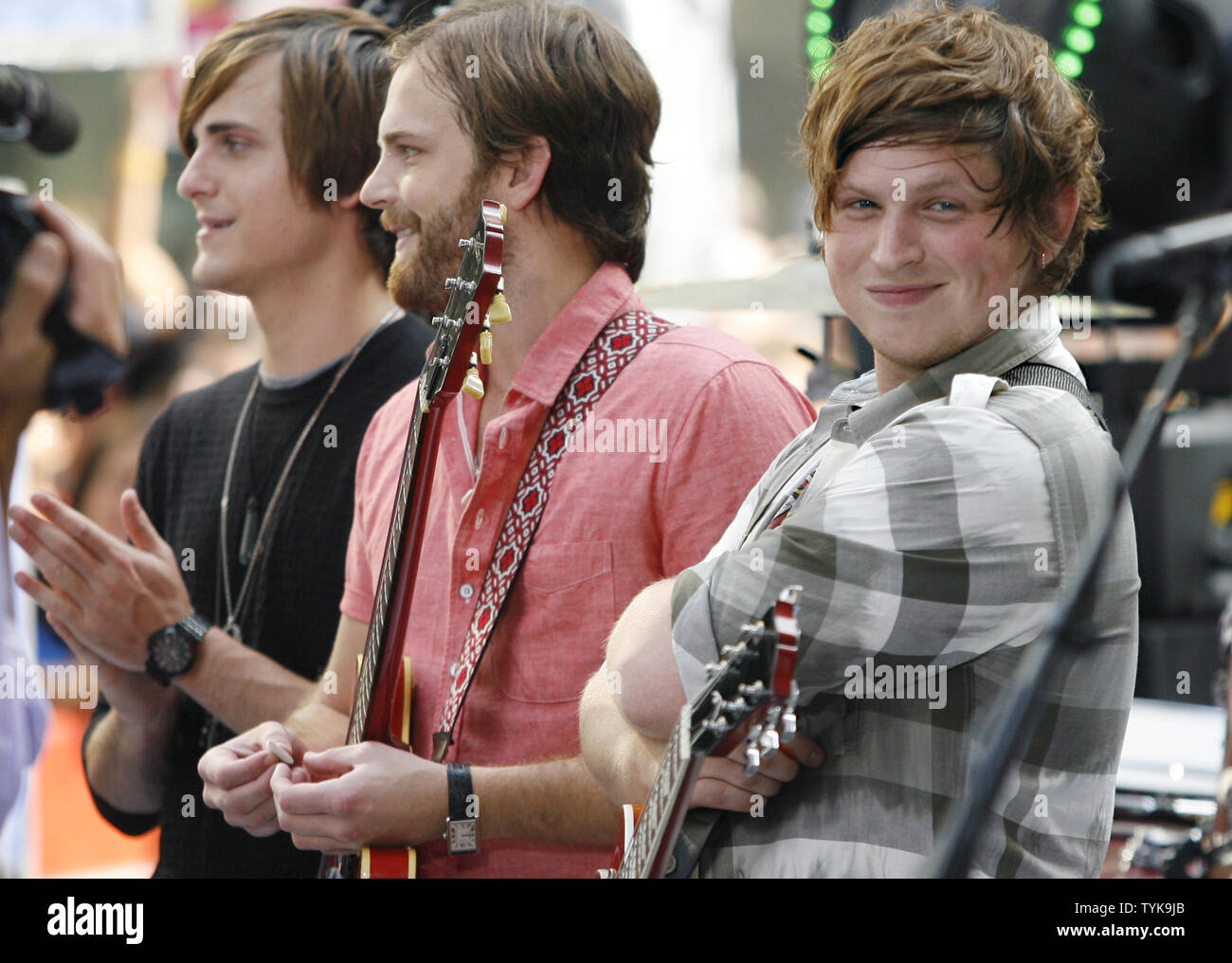 Matthew Followill (R) of The Kings Of Leon smiles before performing on ...