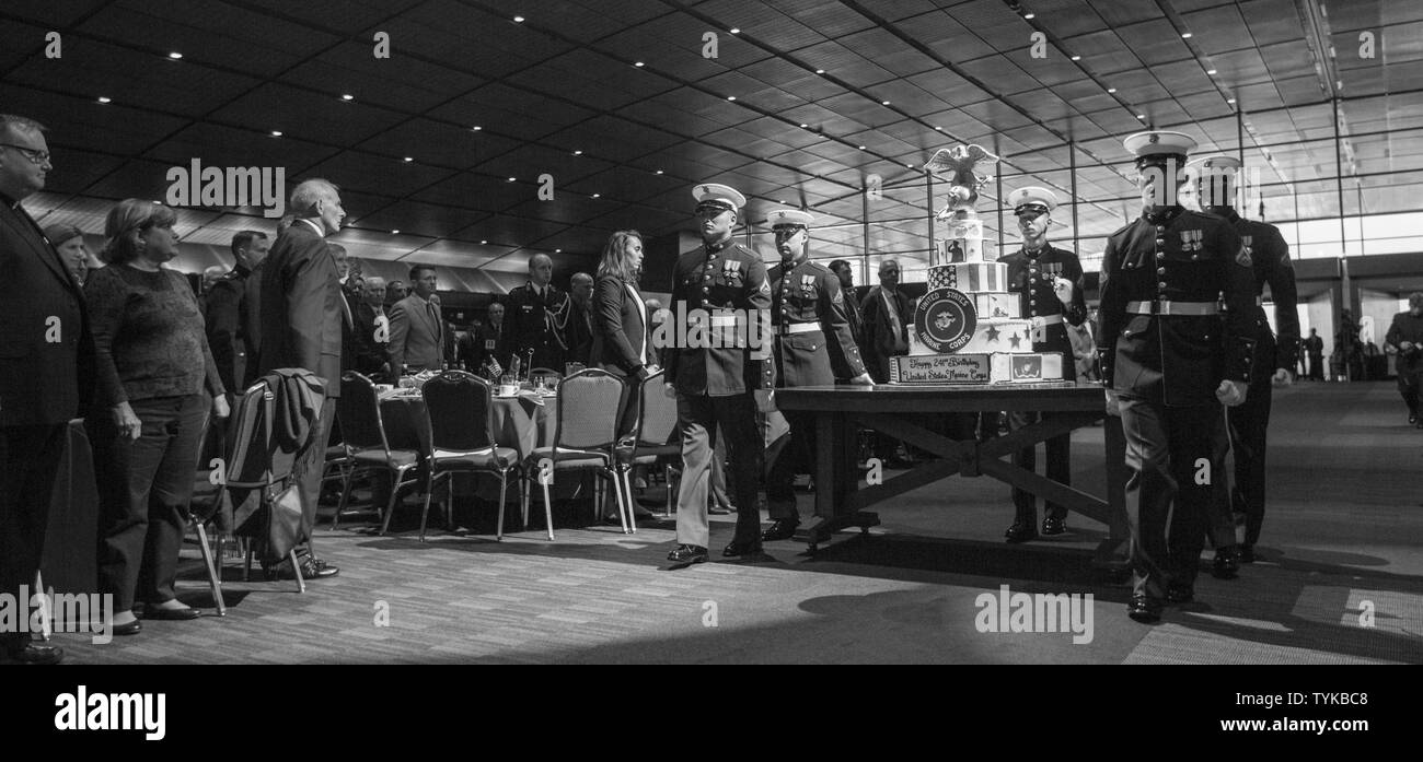 U.S. Marines with Marine Barracks Washington present a birthday cake at ...