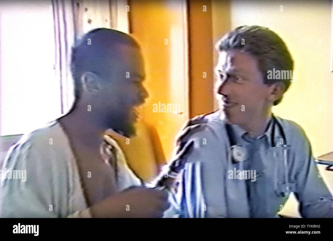 5B, Ward 5B patient with medical staff, 2018. © RYOT Films / courtesy ...