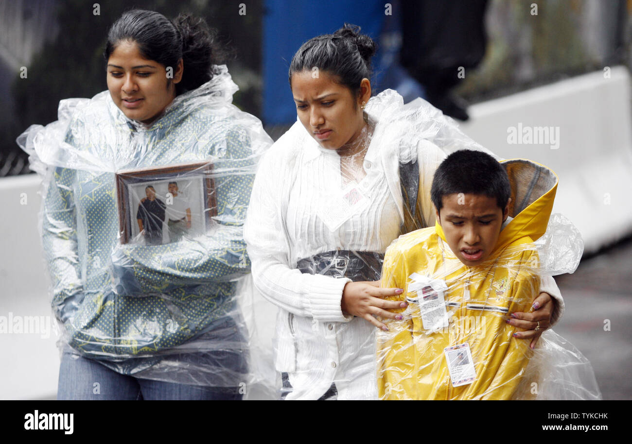 Loved ones of the victims who lost their lives walk to Ground Zero, the ...
