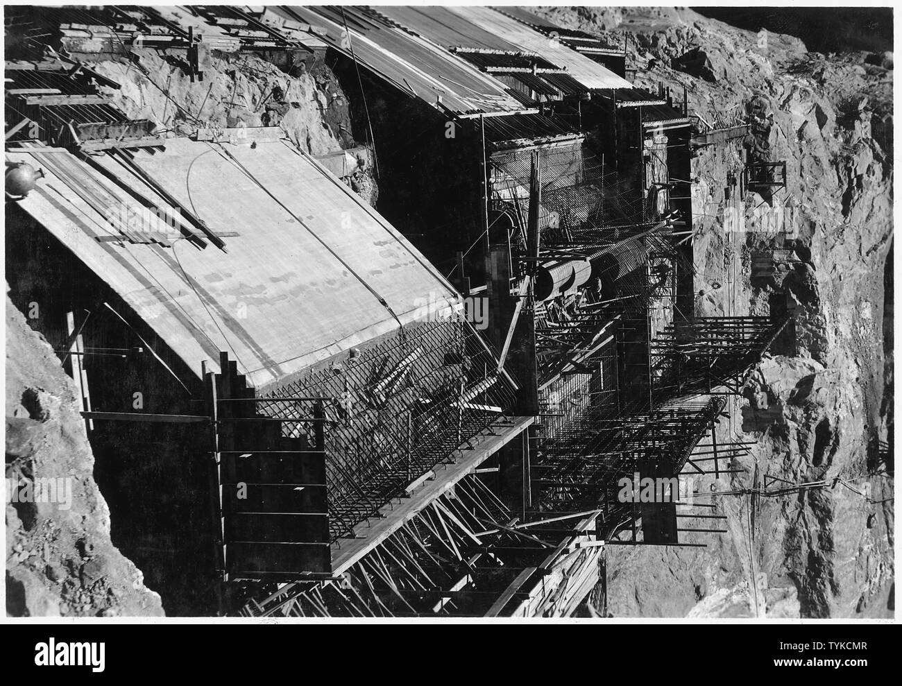 Spoil trucks, 14-cubic yard capacity, dumping on high level Arizona ...