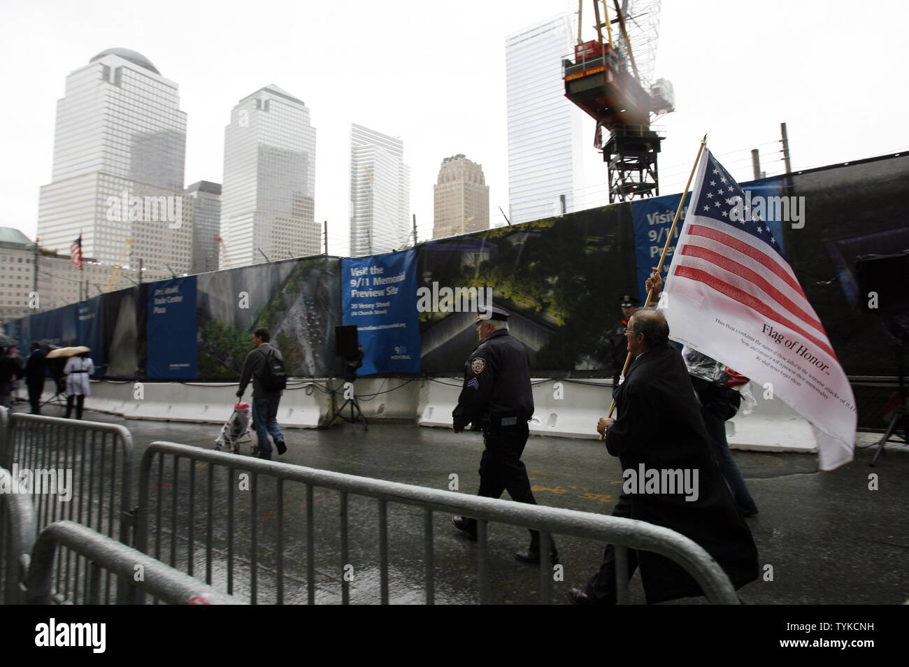 Loved ones of the victims who lost their lives walk to Ground Zero, the ...