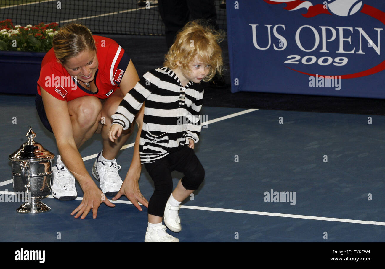 Kim Clijsters of Belgium watches daughter Jada Ellie run after ...