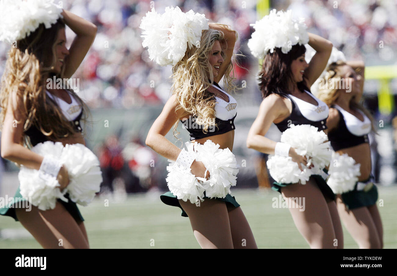 The New York Jets Flight Crew cheerleaders dance during a time out in ...