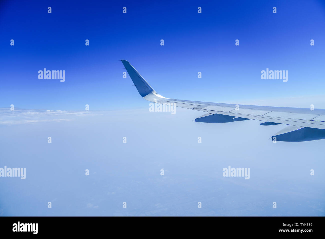 Aircraft wings in the sky Stock Photo - Alamy