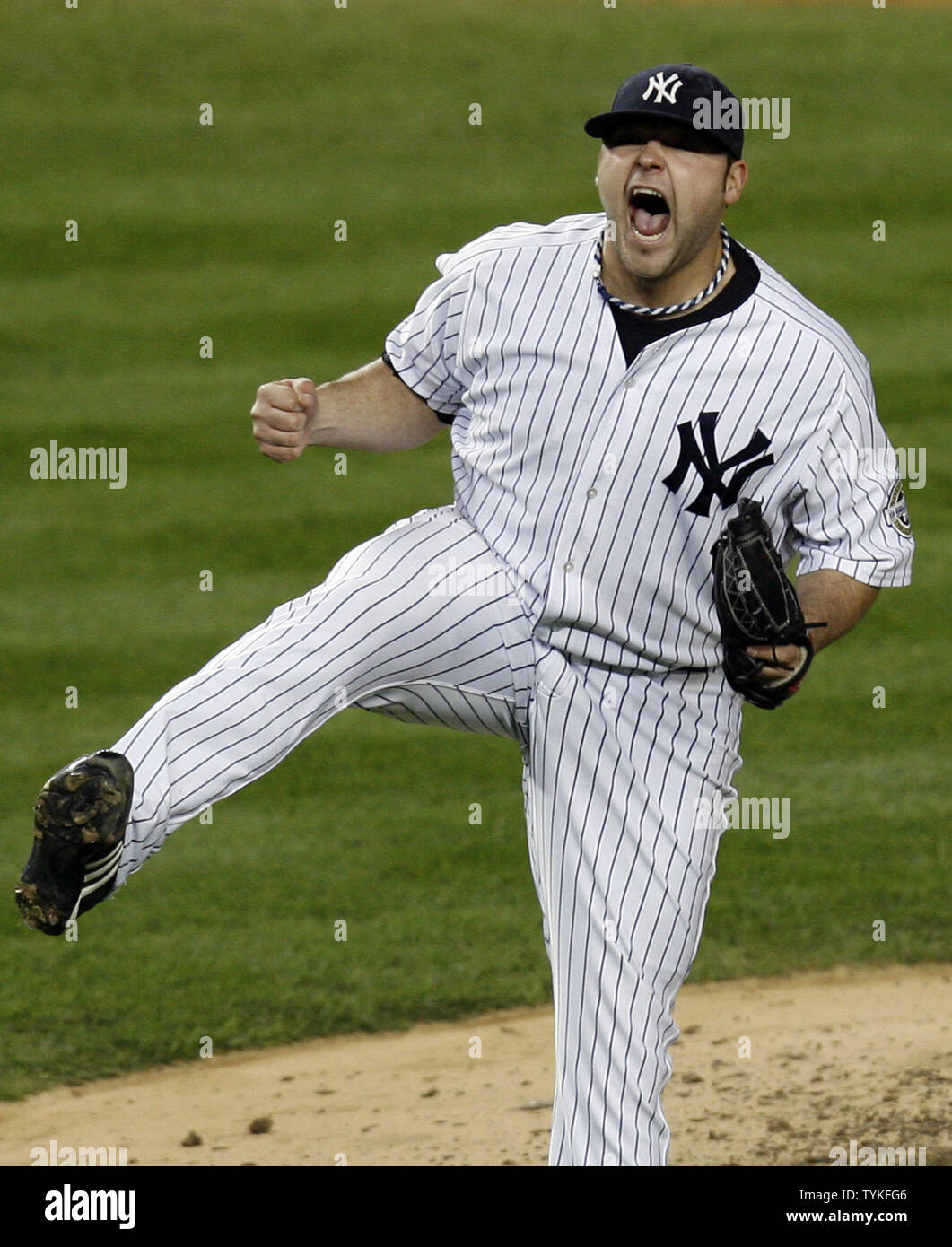 New York Yankees relief pitcher Joba Chamberlain reacts at the end of ...