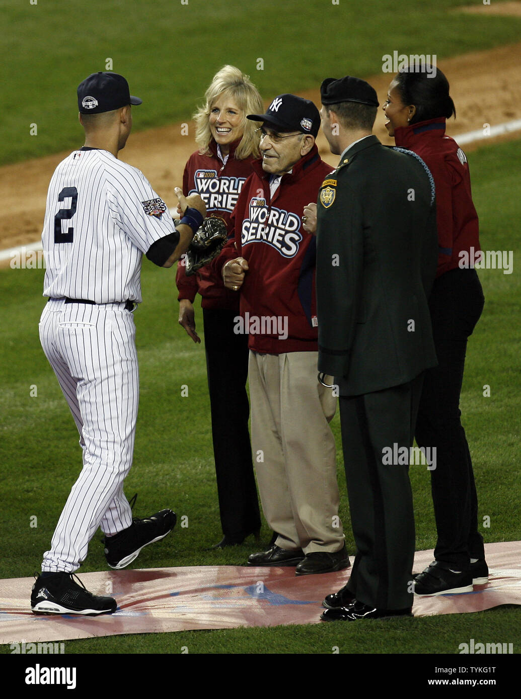 Derek Jeter greets Dr. Jill Biden (2nd L), former New York Yankee Yogi ...