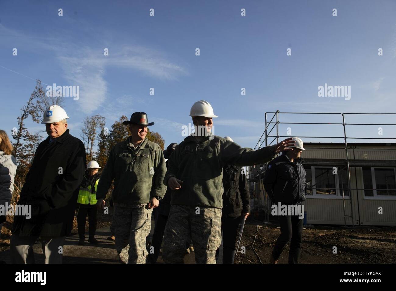 Col. Joe Mcfall, 52nd Fighter Wing commander, center left, and Chief ...