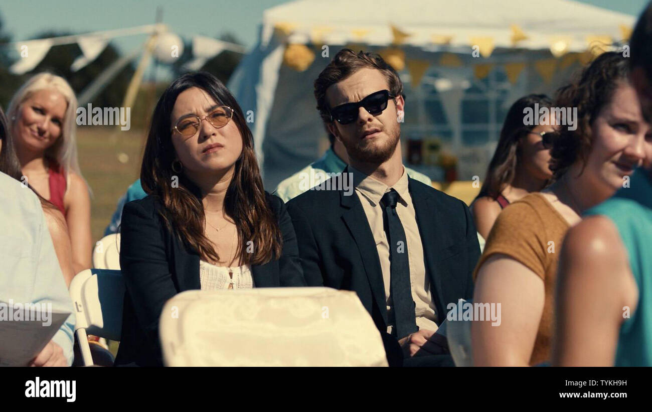 PLUS ONE, from left: Maya Erskine, Jack Quaid, 2019. © RLJE Films ...