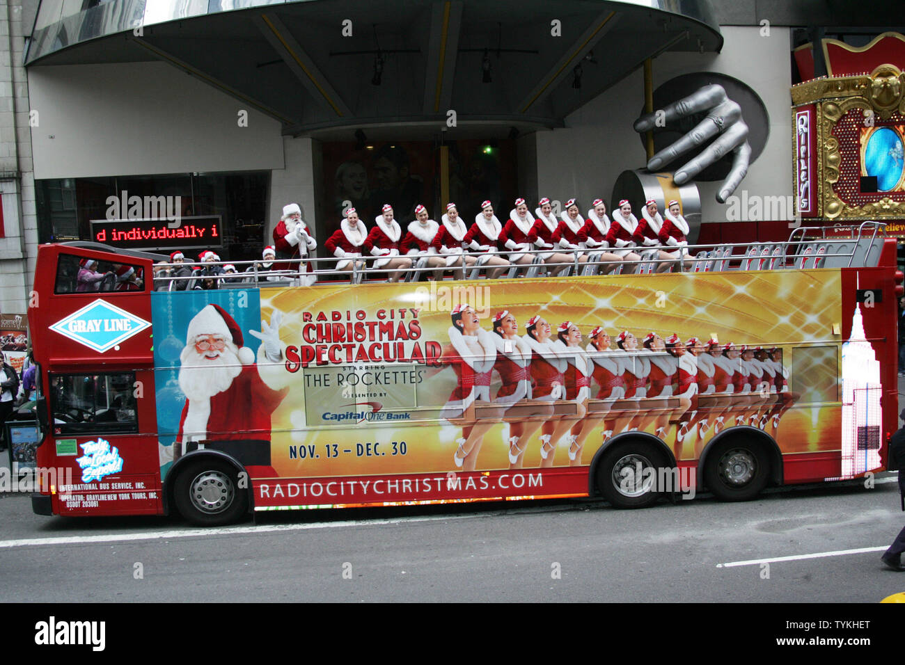 Santa Claus joins the Radio City Rockettes and their wax figure (3rd ...