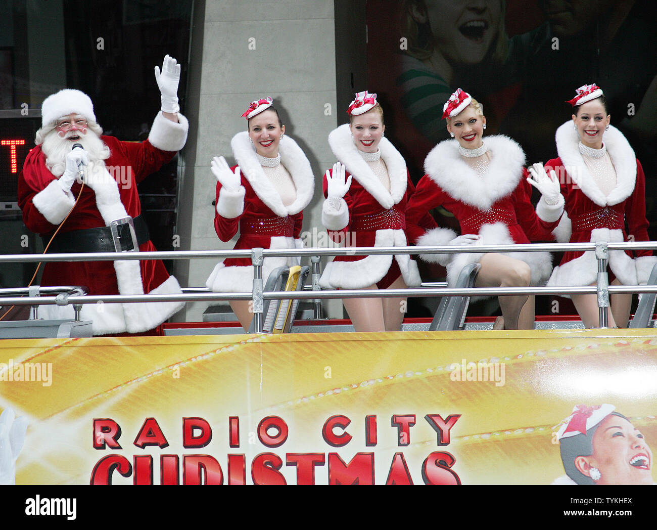 Santa Claus joins the Radio City Rockettes and their wax figure (3rd ...