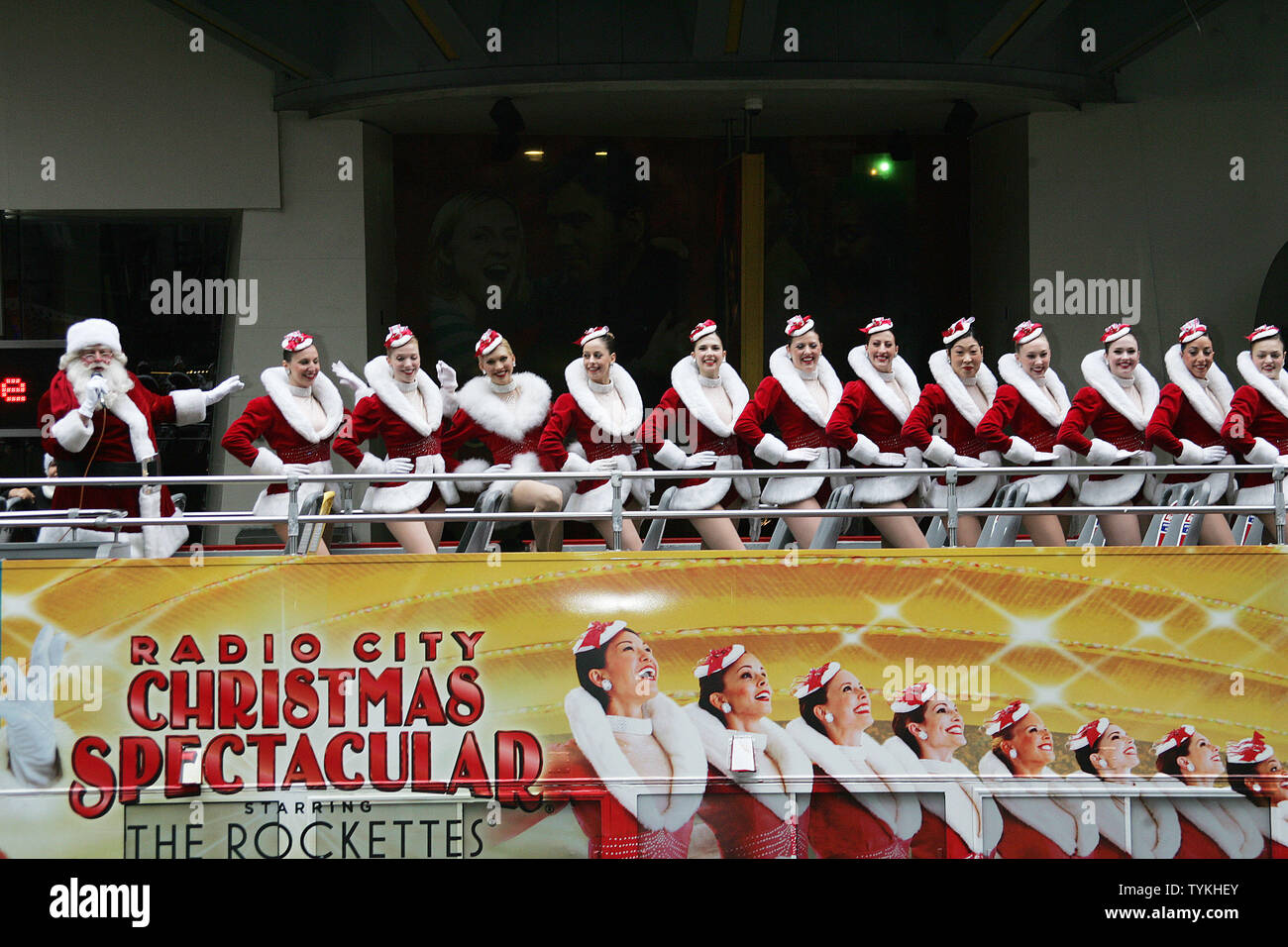 Santa Claus joins the Radio City Rockettes and their wax figure (3rd ...
