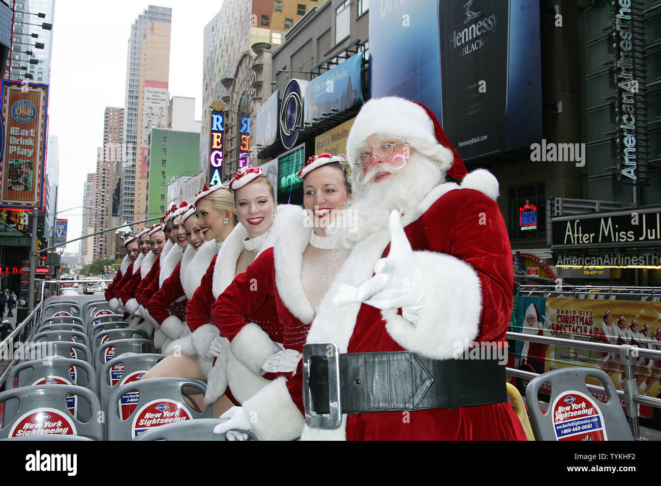 Santa Claus joins the Radio City Rockettes and their wax figure (3rd ...