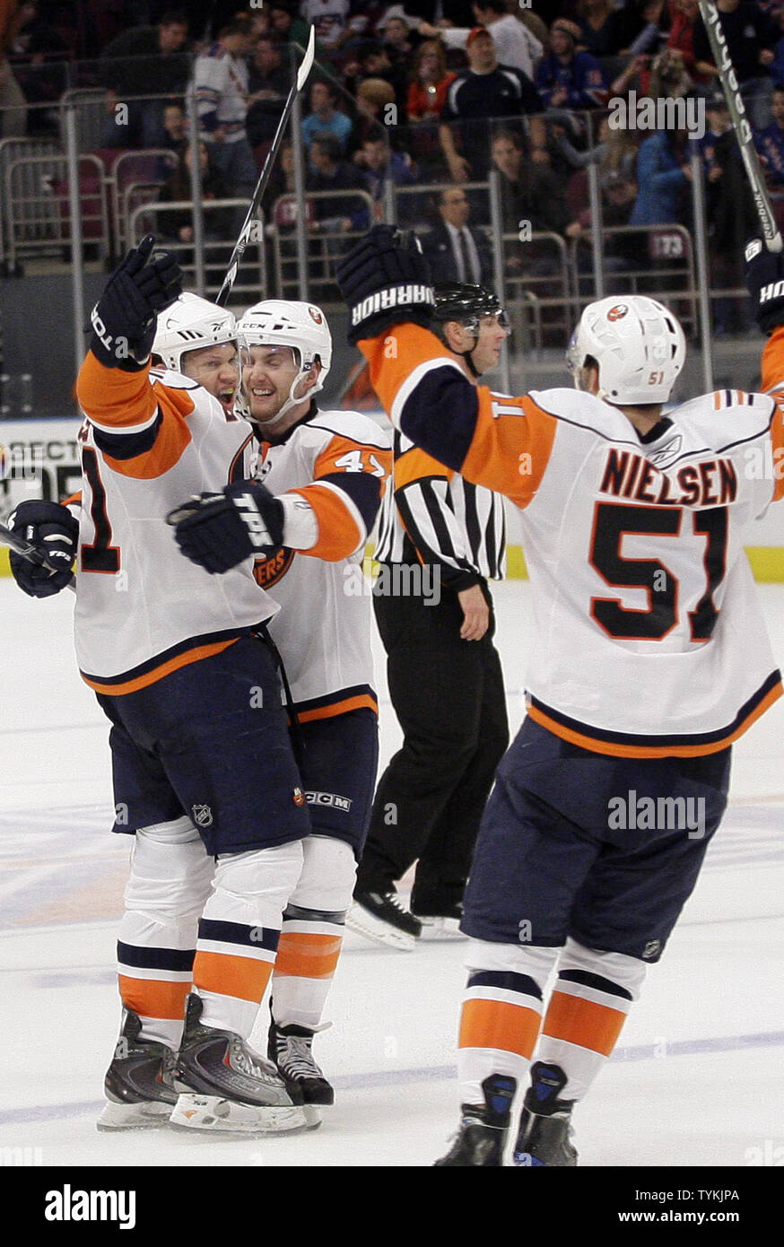 New York Islanders Kyle Okposo, Andrew MacDonald and Frans Nielsen ...