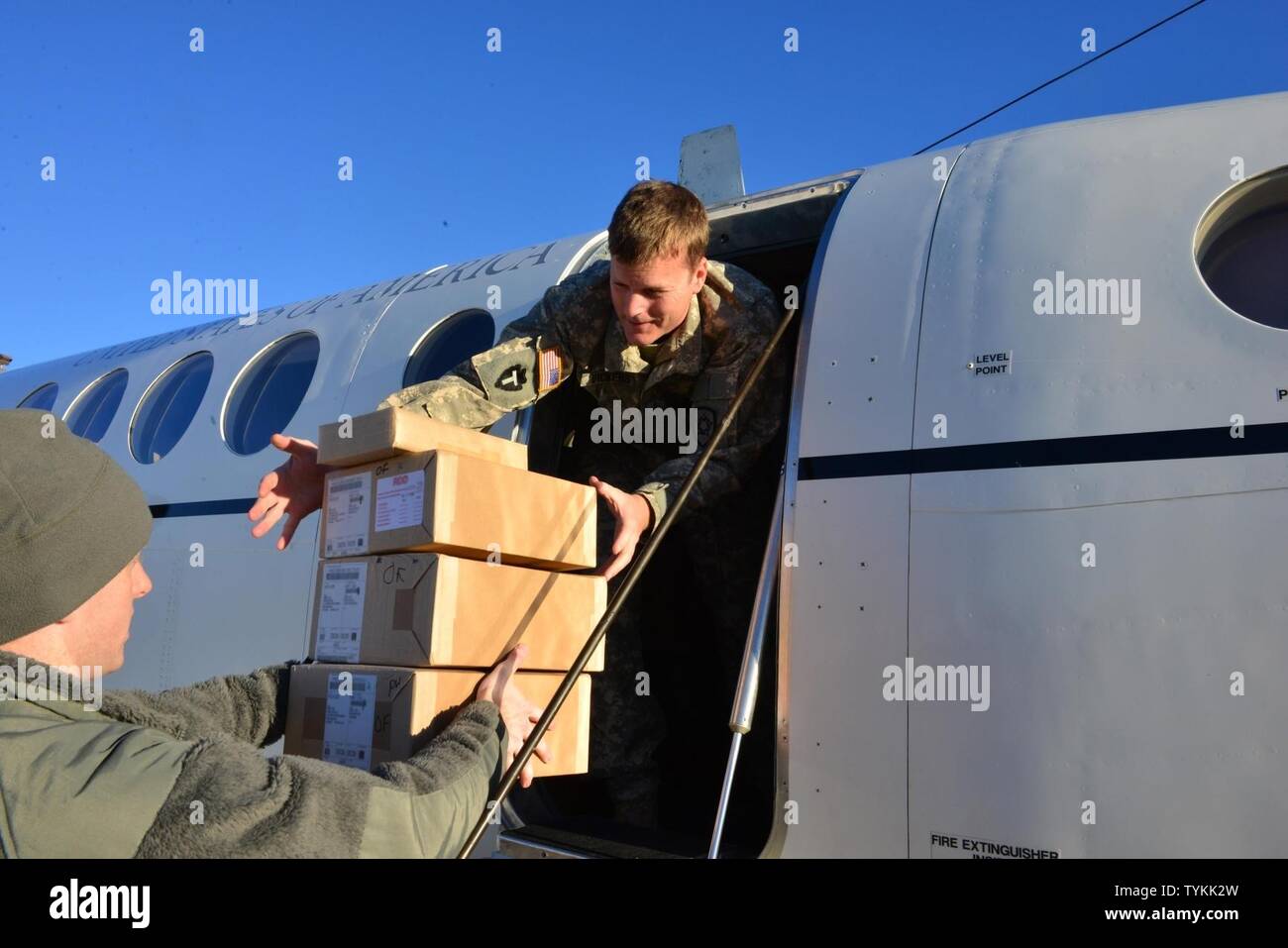 Chief Warrant Officer Richard Vickers, a pilot with the Defense Courier ...