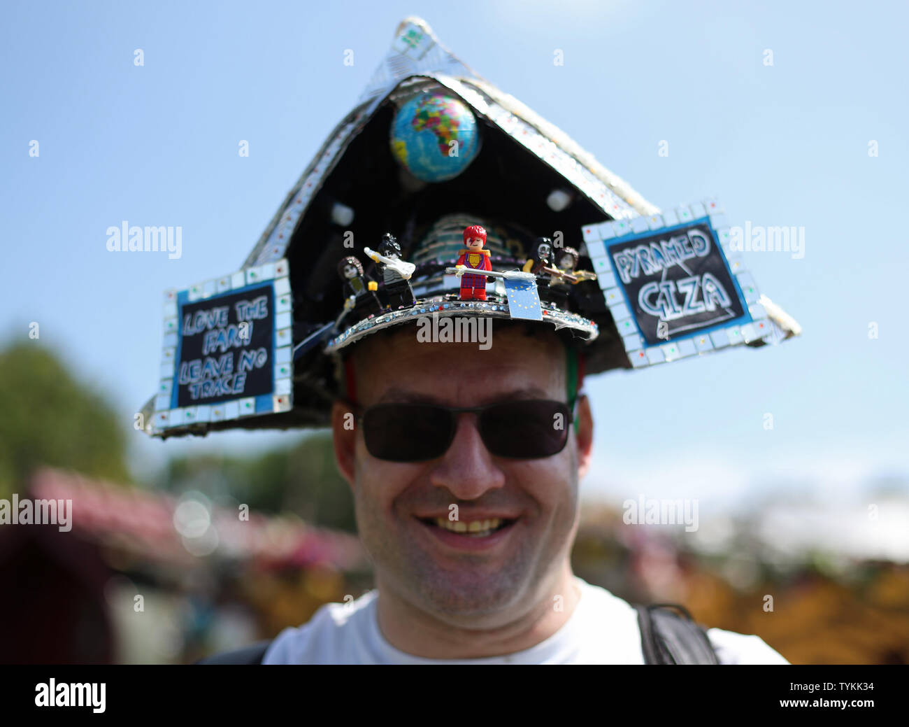 A festival goer wearing a Pyramid Stage hat on the first day of the ...