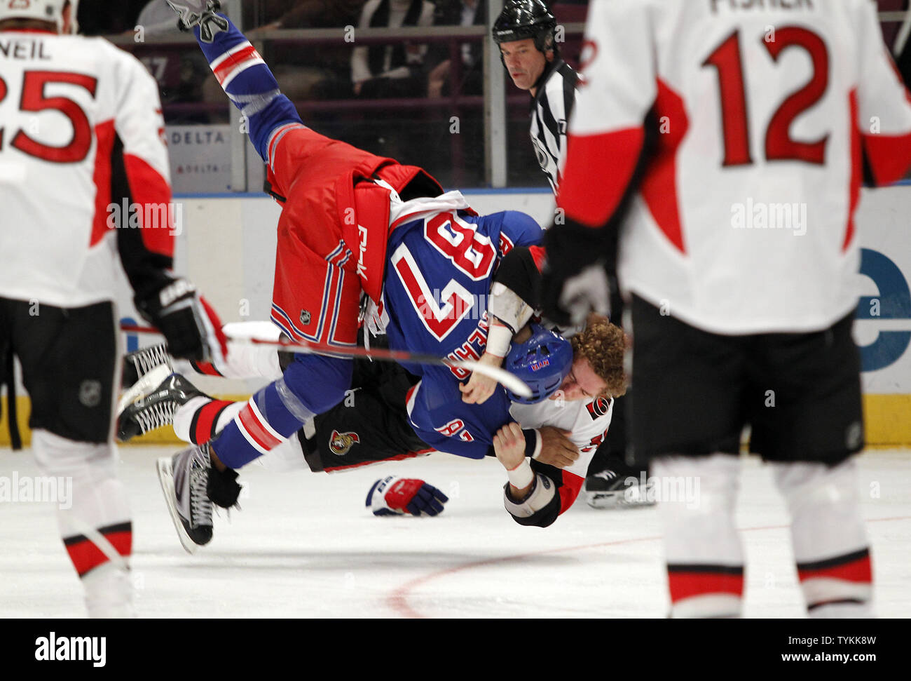 New York Rangers Donald Brashear and Ottawa Senators Matt Carkner get ...