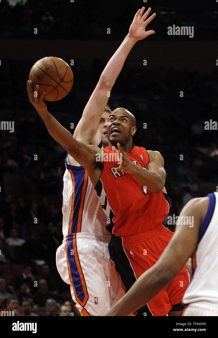 Toronto Raptors Jarrett Jack drives to the basket past New York Knicks ...