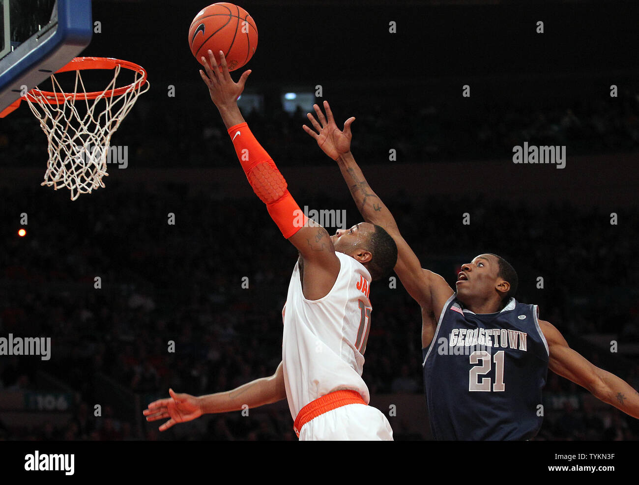 Georgetown Hoyas Jason Clark tries to block the shot from Syracuse ...