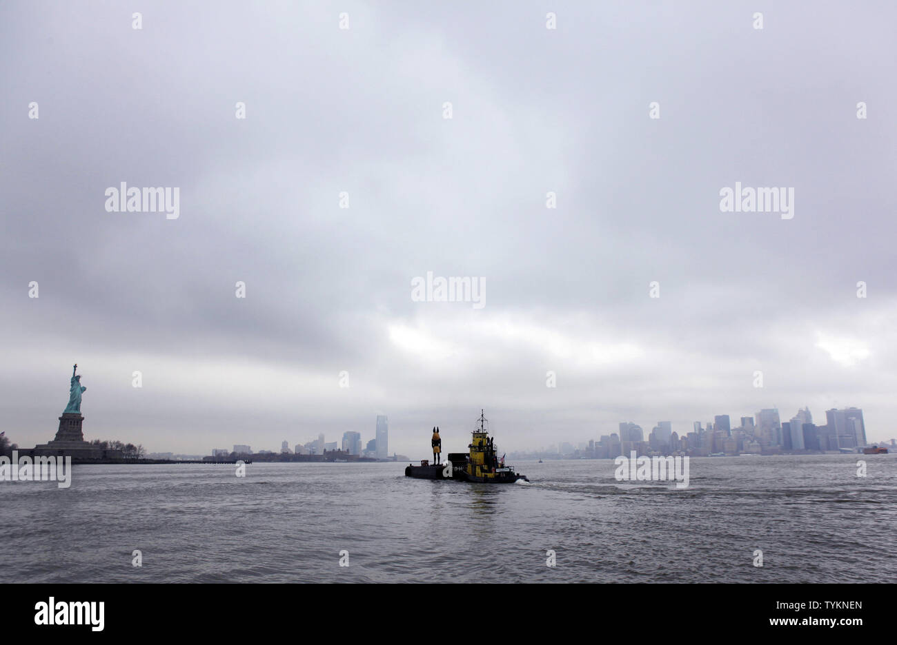 A 25-foot tall, 7 ton replica statue of the Egyptian God Anubis passes ...