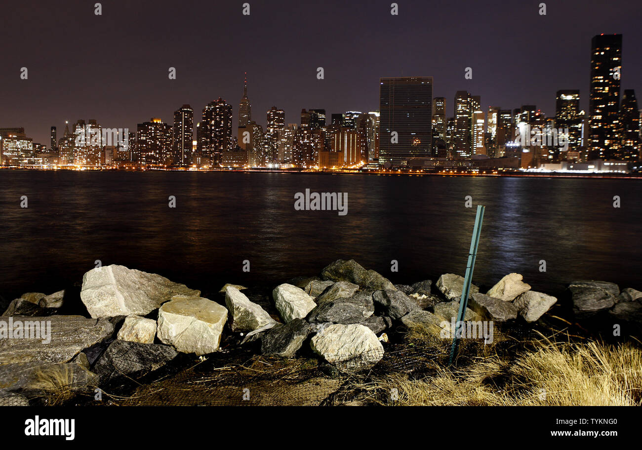 The lights of the Empire State Building and United Nations Building are ...