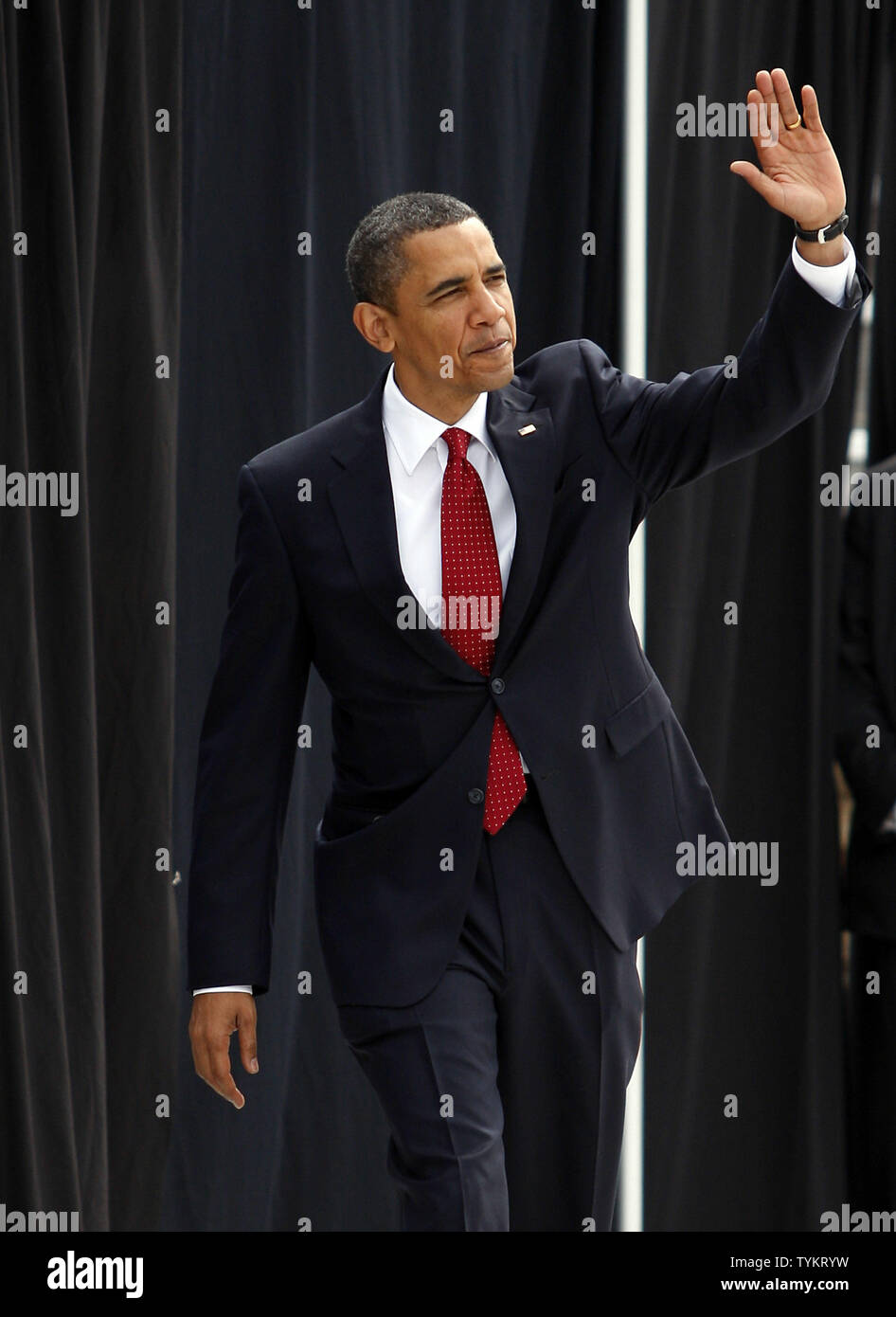 United States President Barack Obama waves after being introduced ...