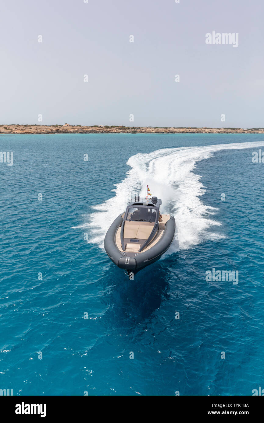 inflatable motor boat in formentera, navigate in the beautiful sea of ...