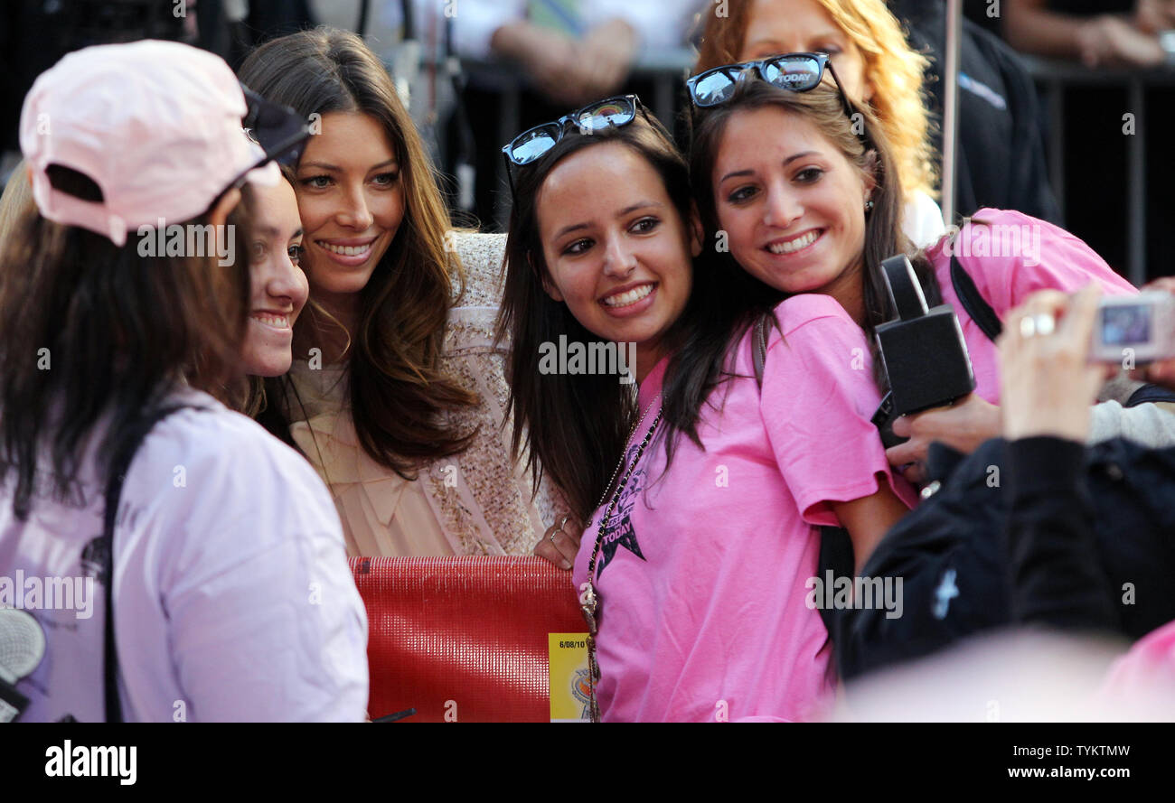 Actress Jessica Biel takes pictures with fans before Christina Aguilera ...