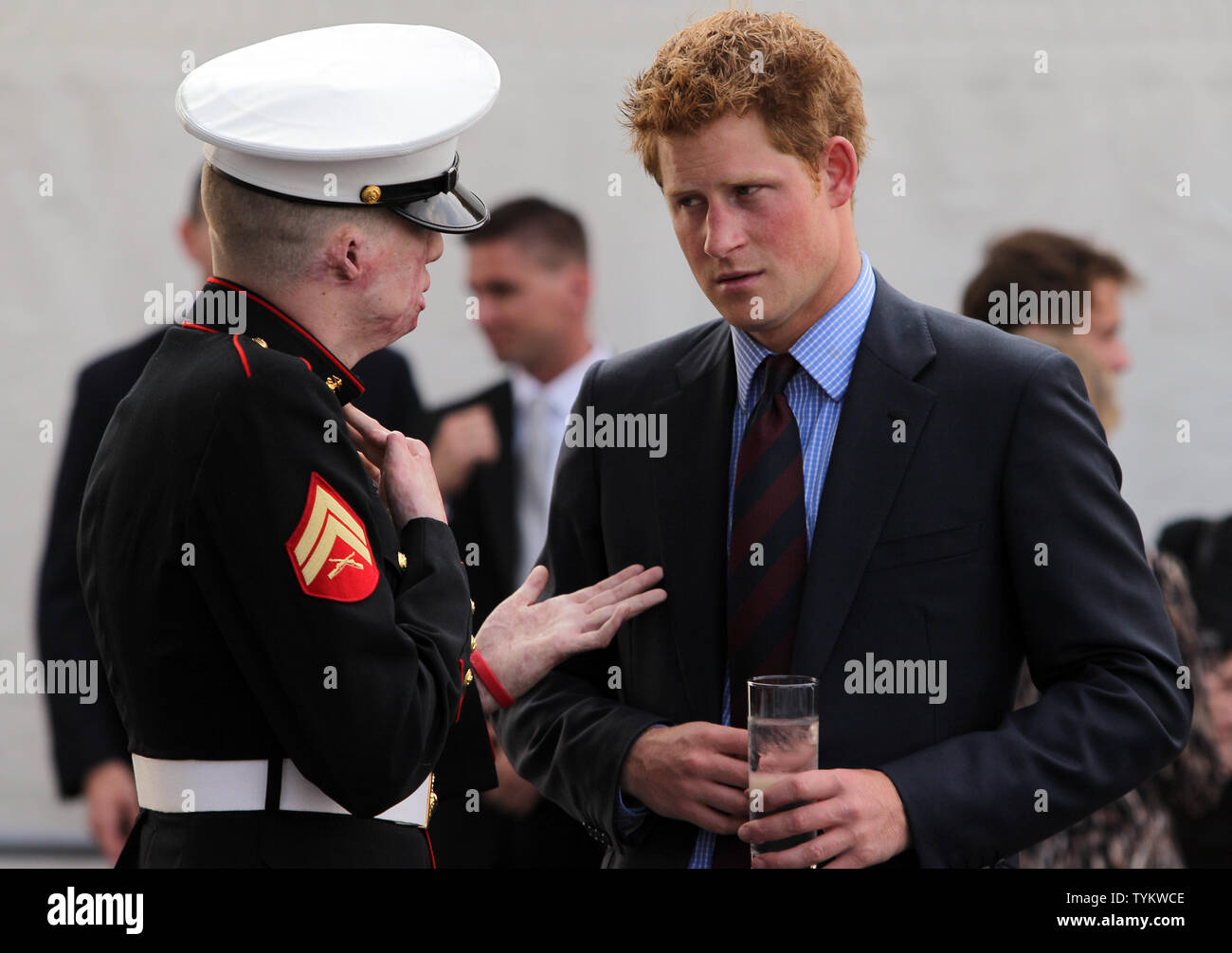 Britain's HRH Prince Harry (R) speaks with U.S. Marine veteran Aaron ...
