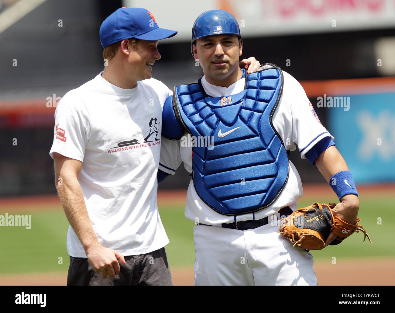 Britain's Prince Harry speaks with New York Mets Rod Barajas after ...