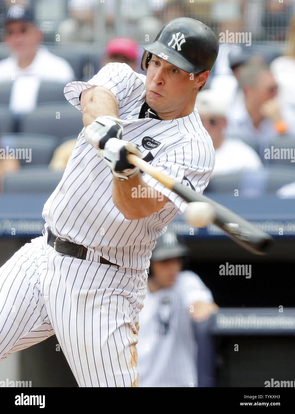 New York Yankees Mark Teixeira drives in a run with a double in the ...