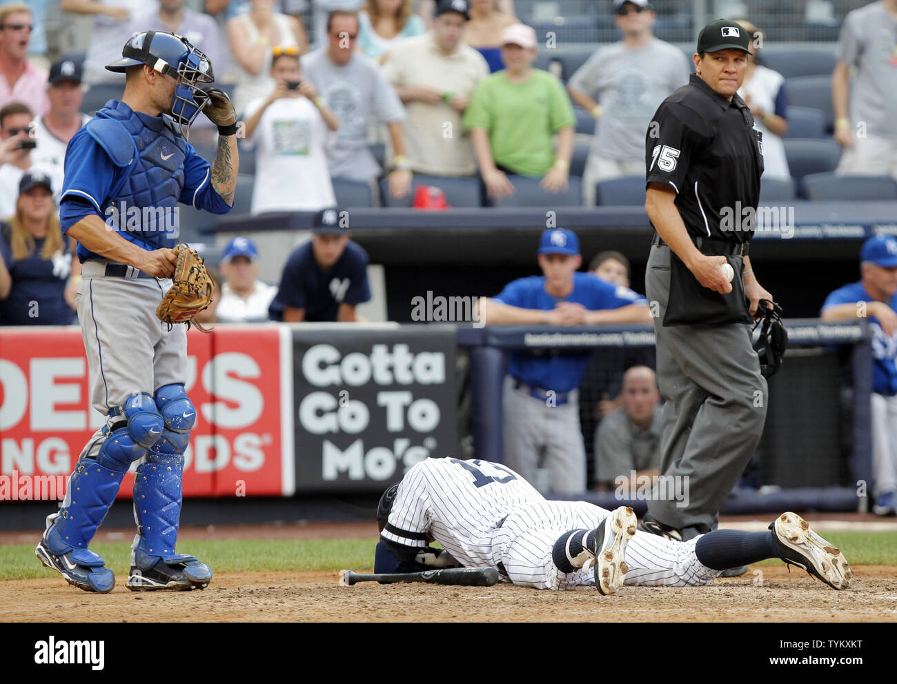 Kansas City Royals Jason Kendall and home plate umpire Chad Fairchild ...