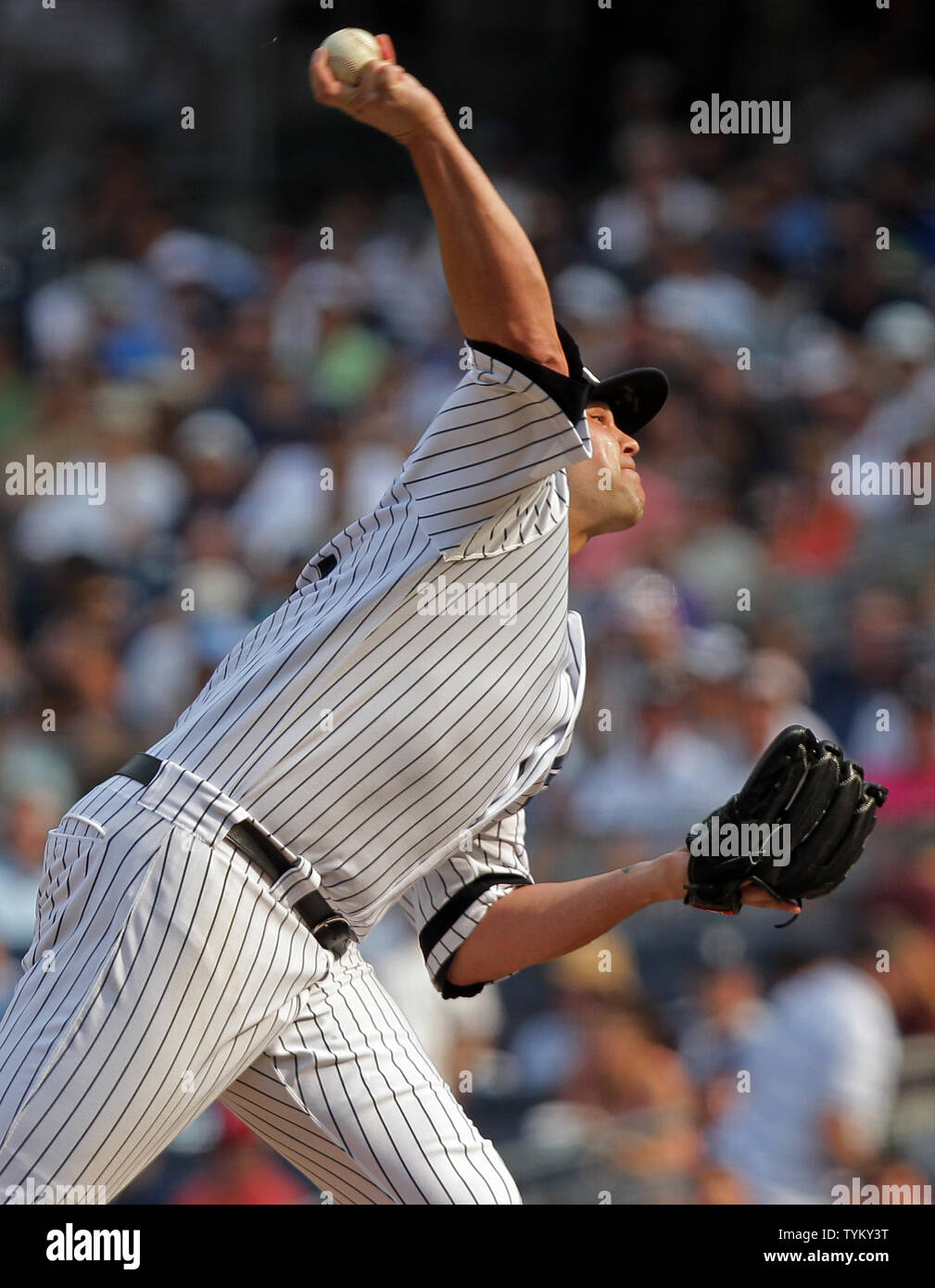 New York Yankees relief pitcher Joba Chamberlain throws a pitch in the ...