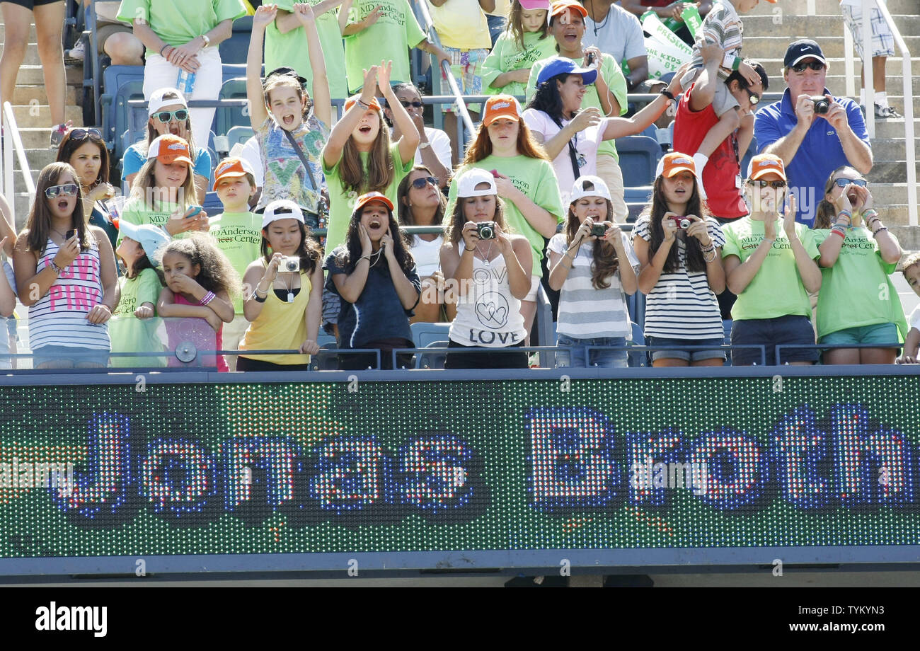 Fans cheer as the Jonas Brothers perform during Arthur Ashe Kids' Day ...