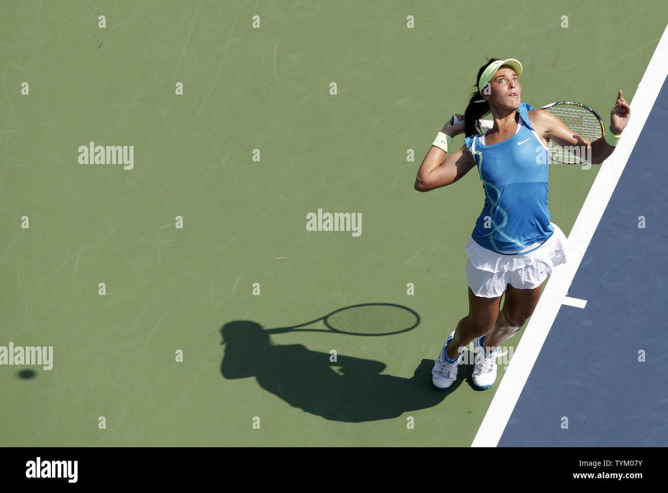 Beatrice Capra of the USA serves to Aravane Rezai of France in the ...