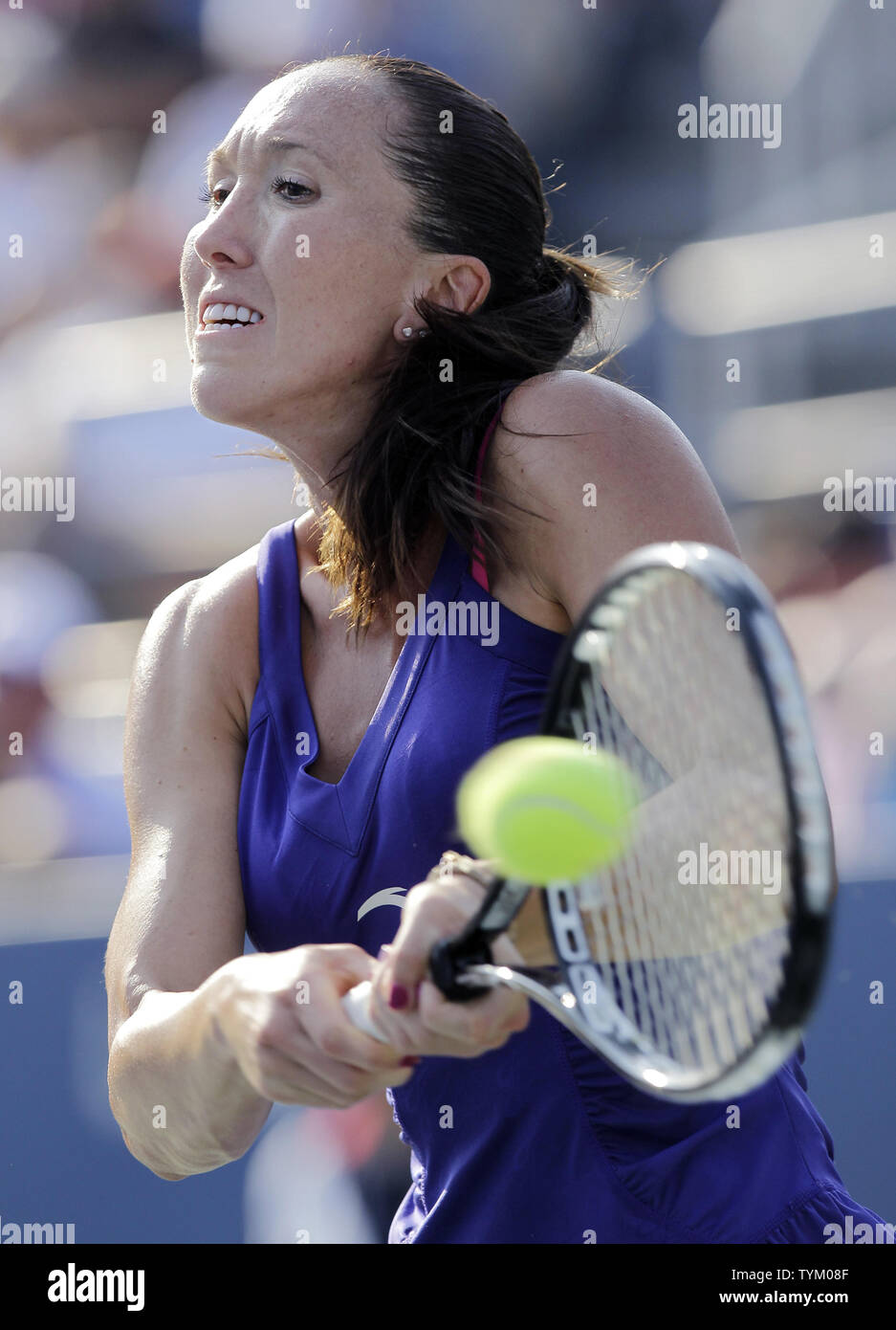 Jelena Jankovic of Serbia hits a backhand to Mirjana Lucic of Croatia ...