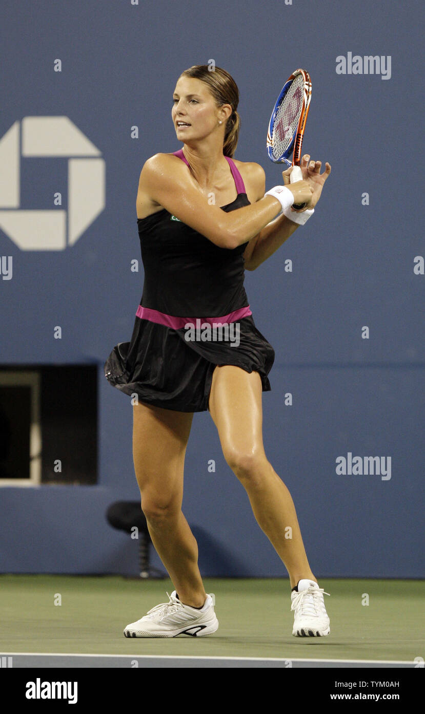 Mandy Minella hits a backhand to Venus Williams on day 5 at the U.S ...