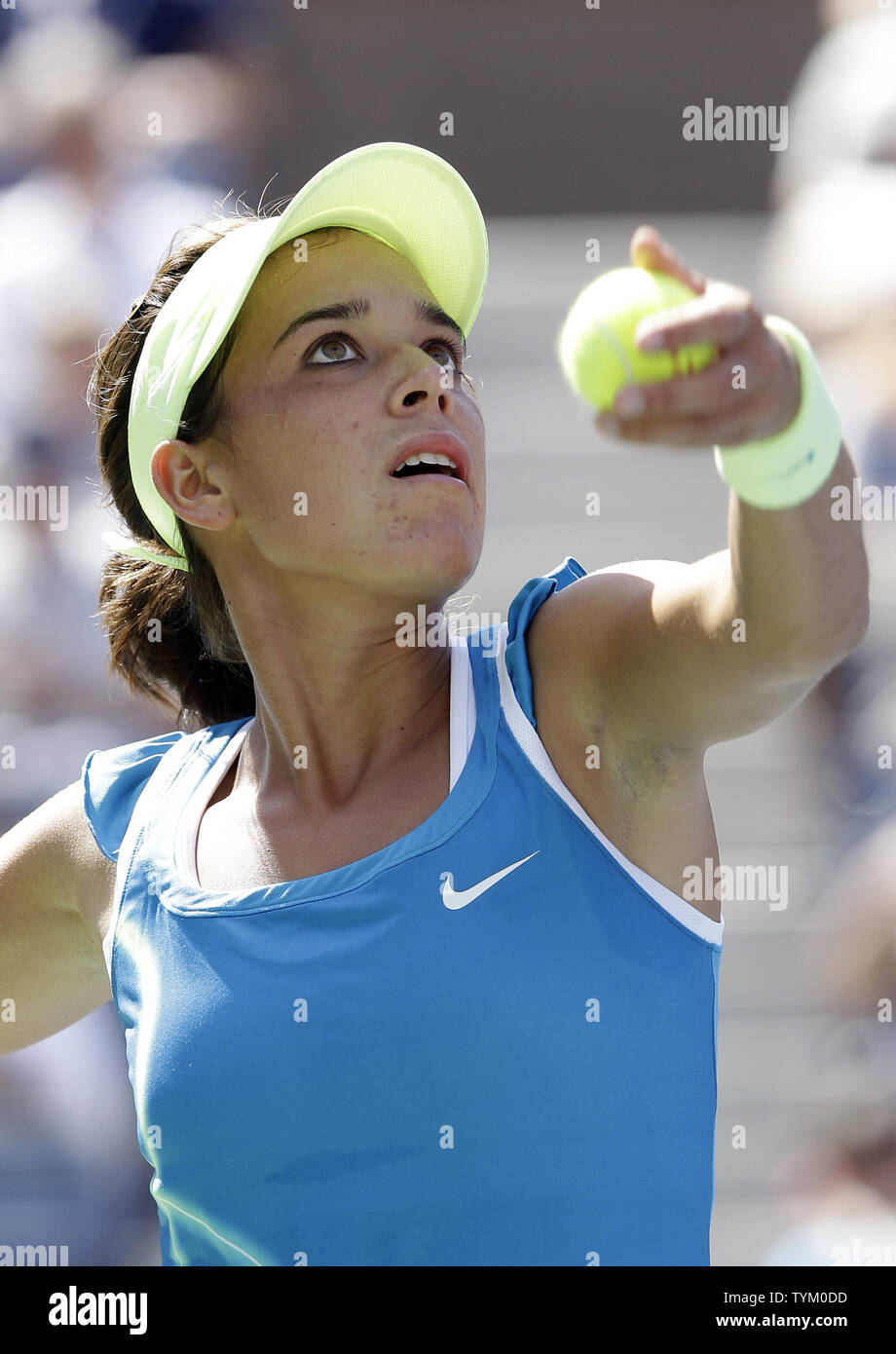 Beatrice Capra of the USA tosses the ball for a serve in her 6-0, 6-0 ...