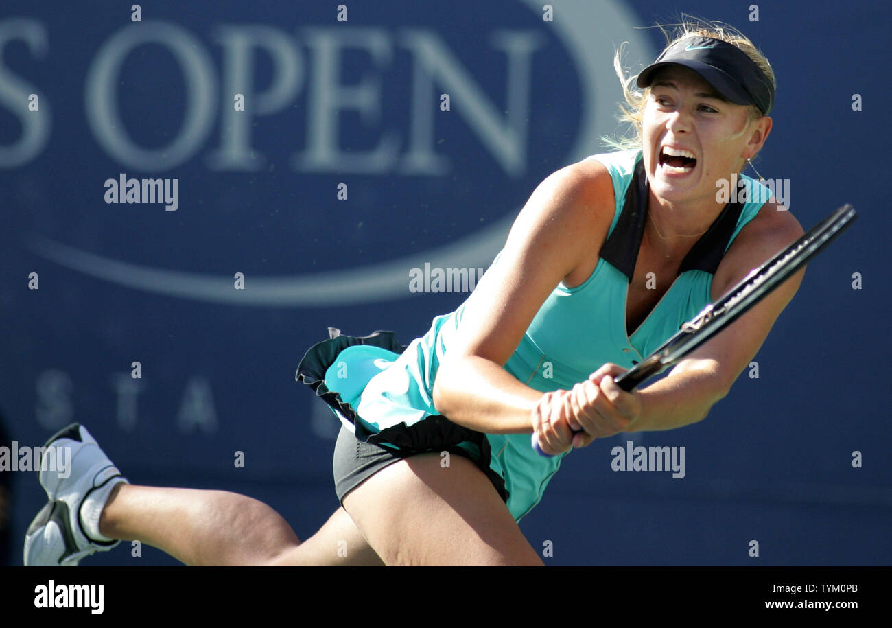Maria Sharapova of Russia runs towards the ball hit by Caroline ...