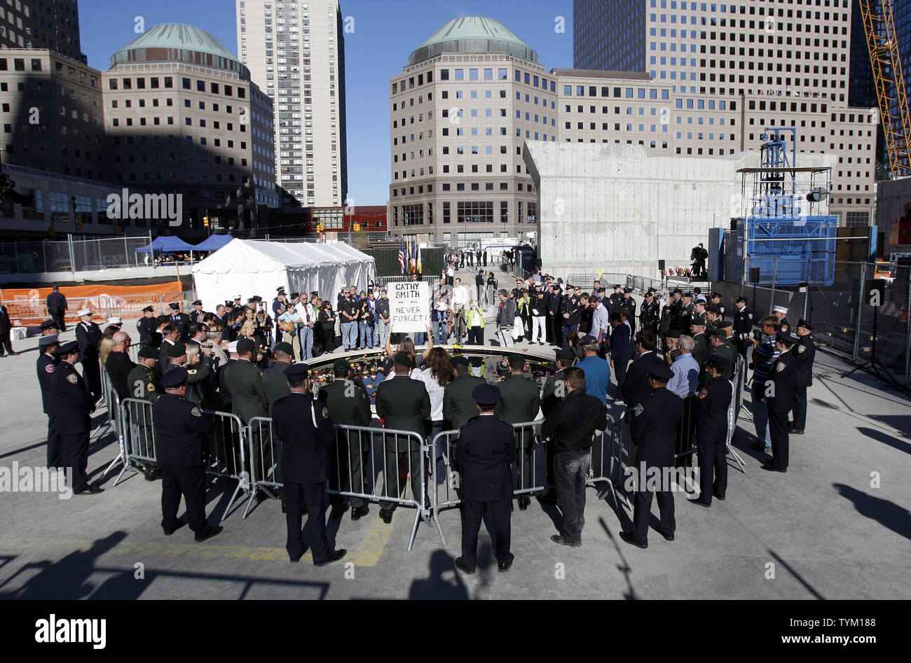 Family members of the victims of 9/11 gather around the Ground Zero ...