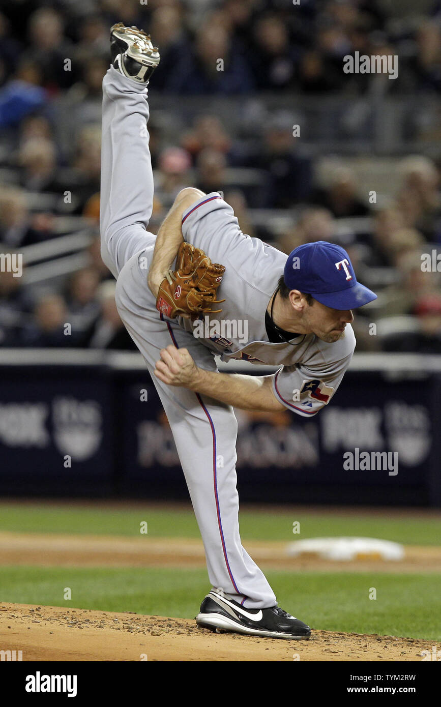 Texas Rangers starting pitcher Cliff Lee throws a pitch in the first ...